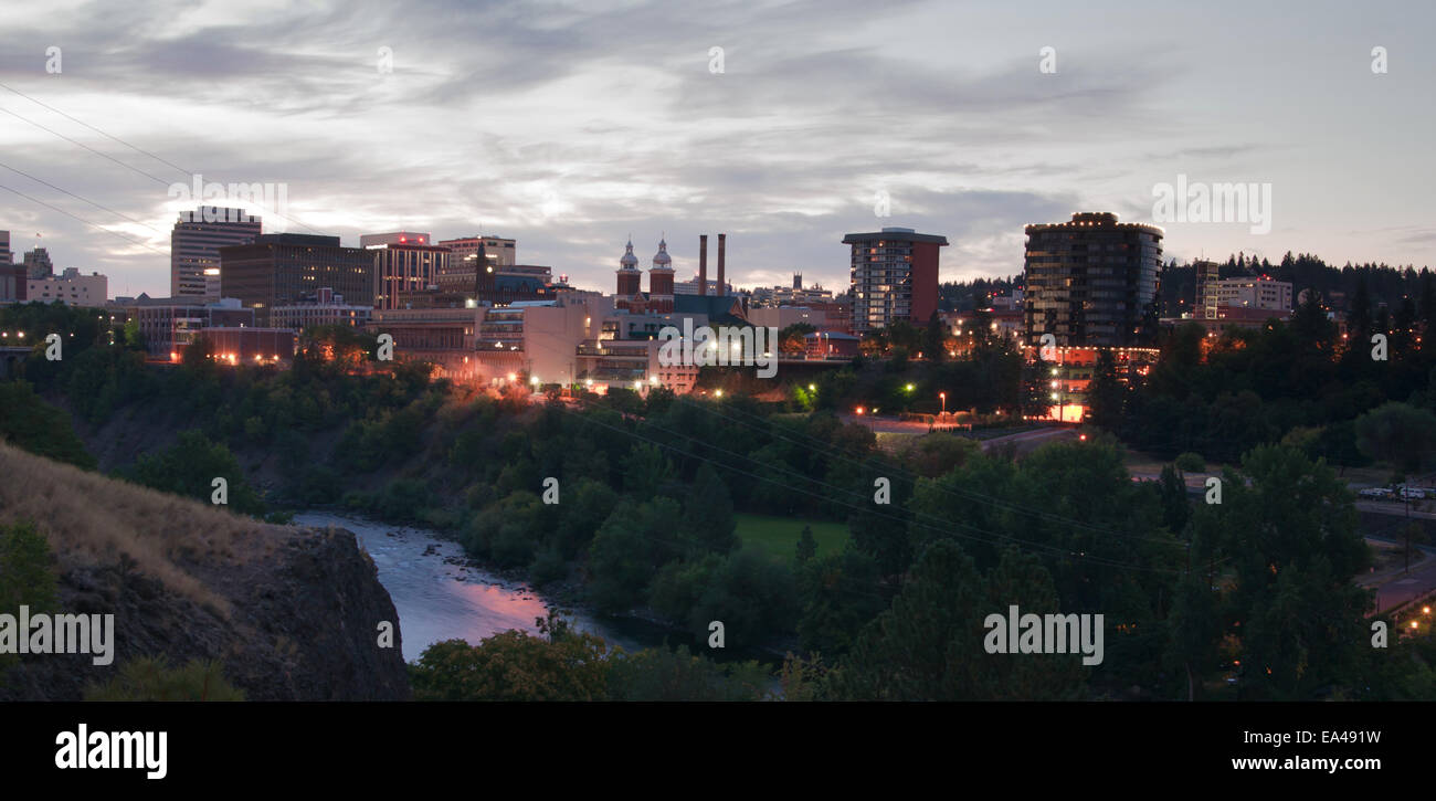 The buildings still have the lights on as the sun comes up in Spokane ...