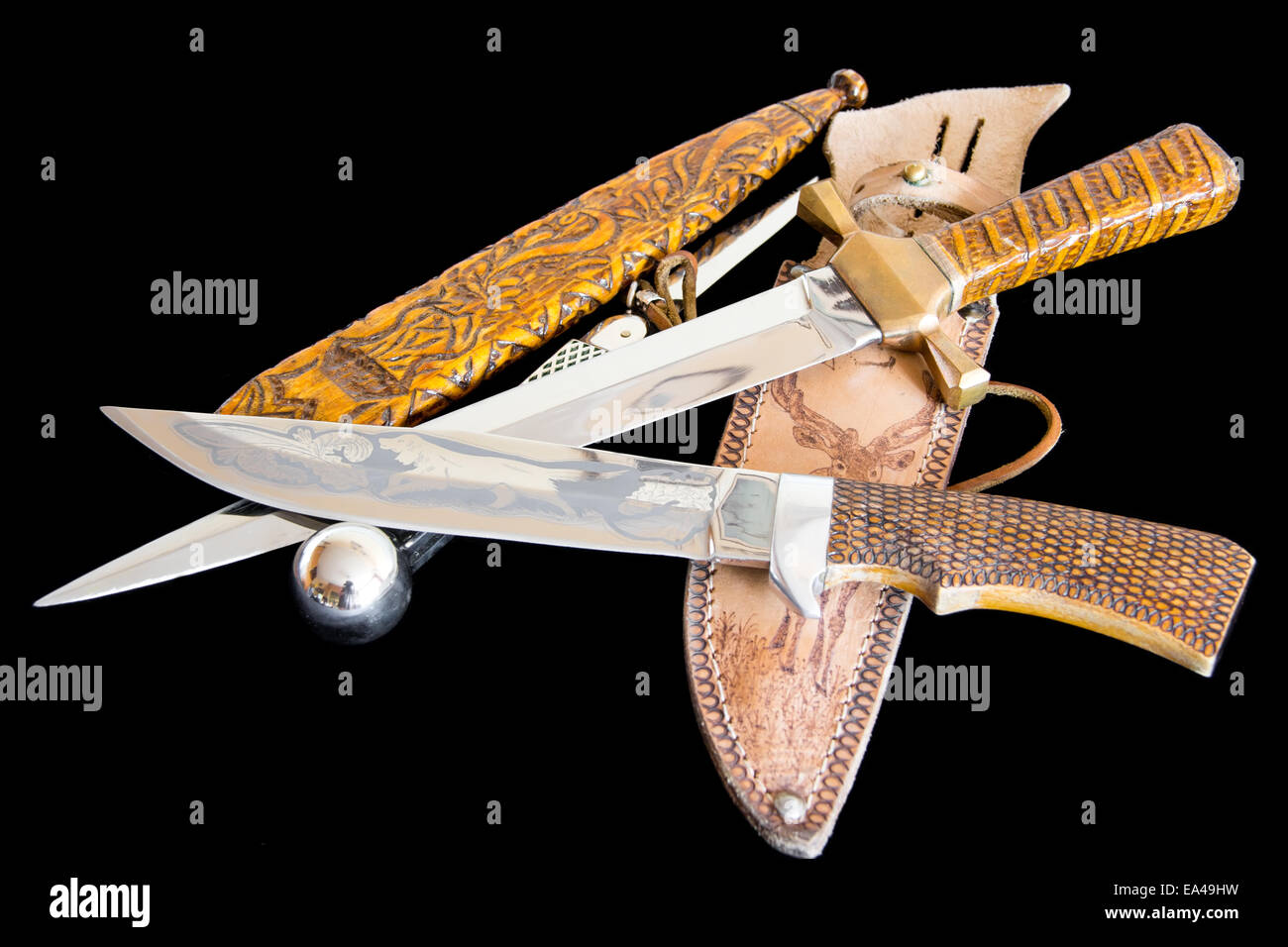 Cold weapon on black background Stock Photo - Alamy