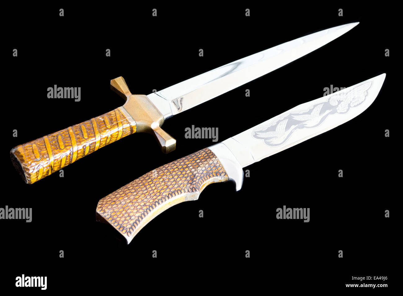Cold weapon on black background Stock Photo - Alamy