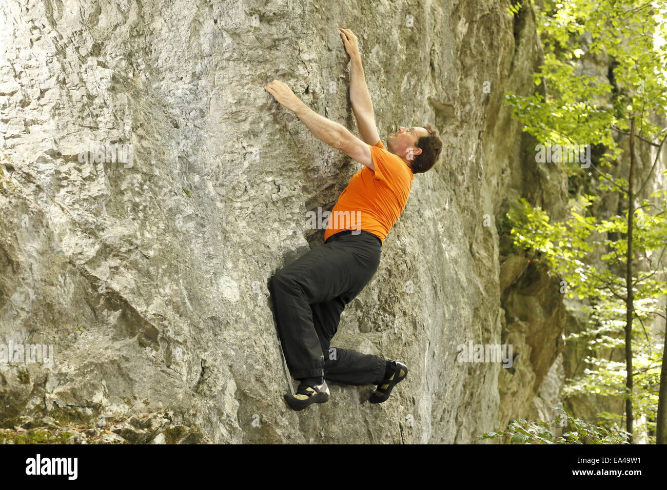 Man move rock hi-res stock photography and images - Alamy