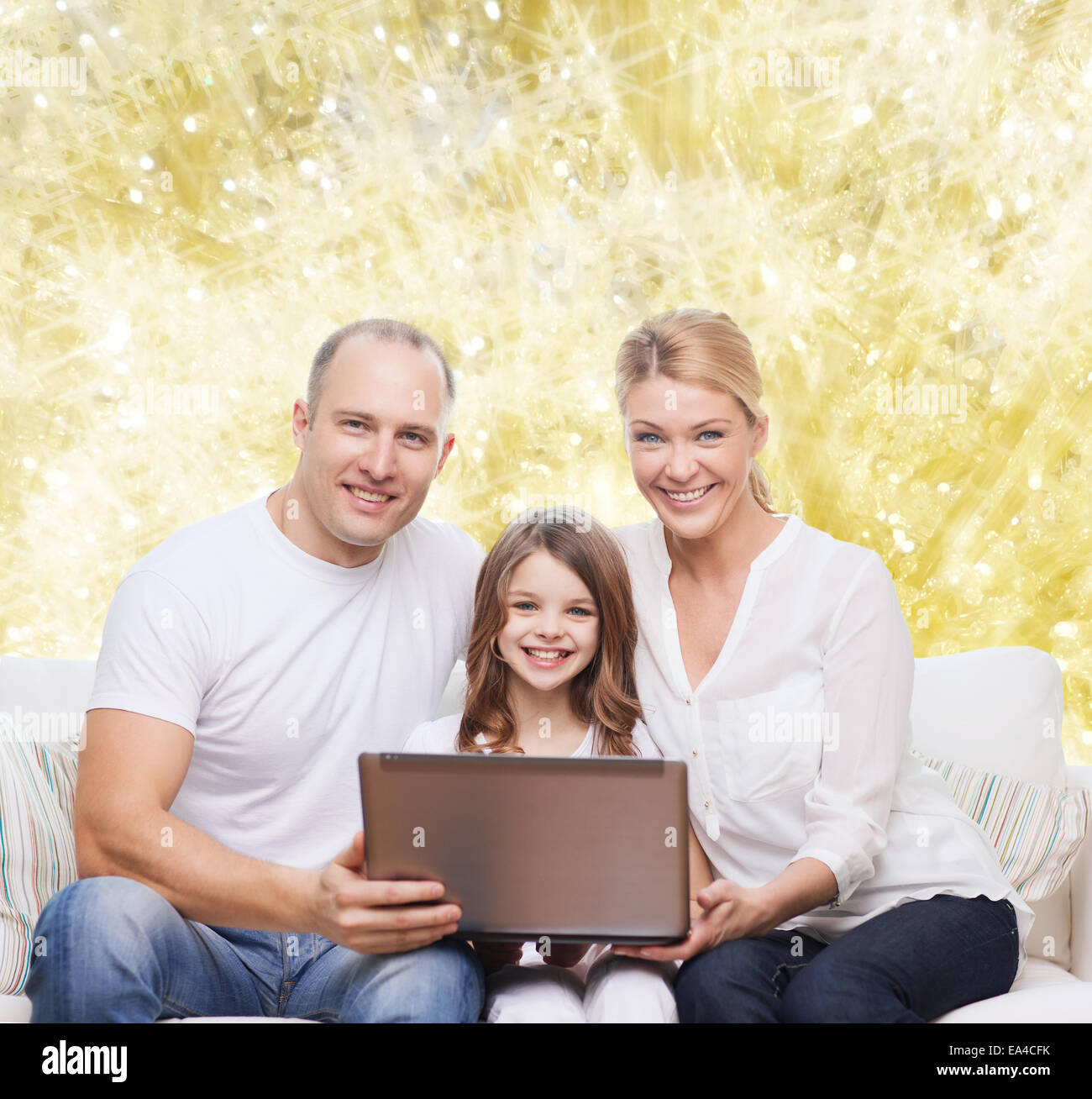smiling family with laptop Stock Photo - Alamy