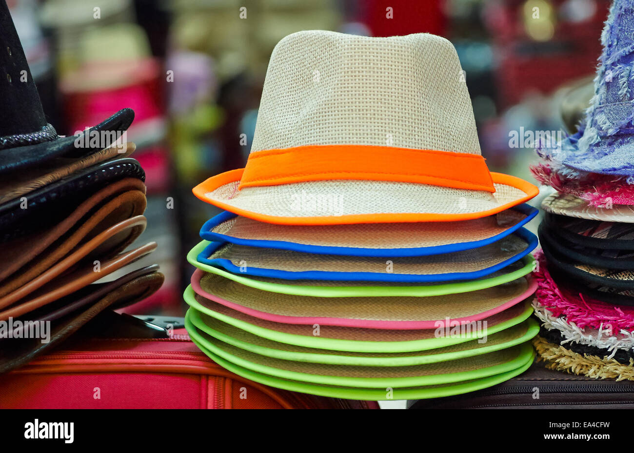 Pile of colorful hats are on sale at the marketplace Stock Photo - Alamy