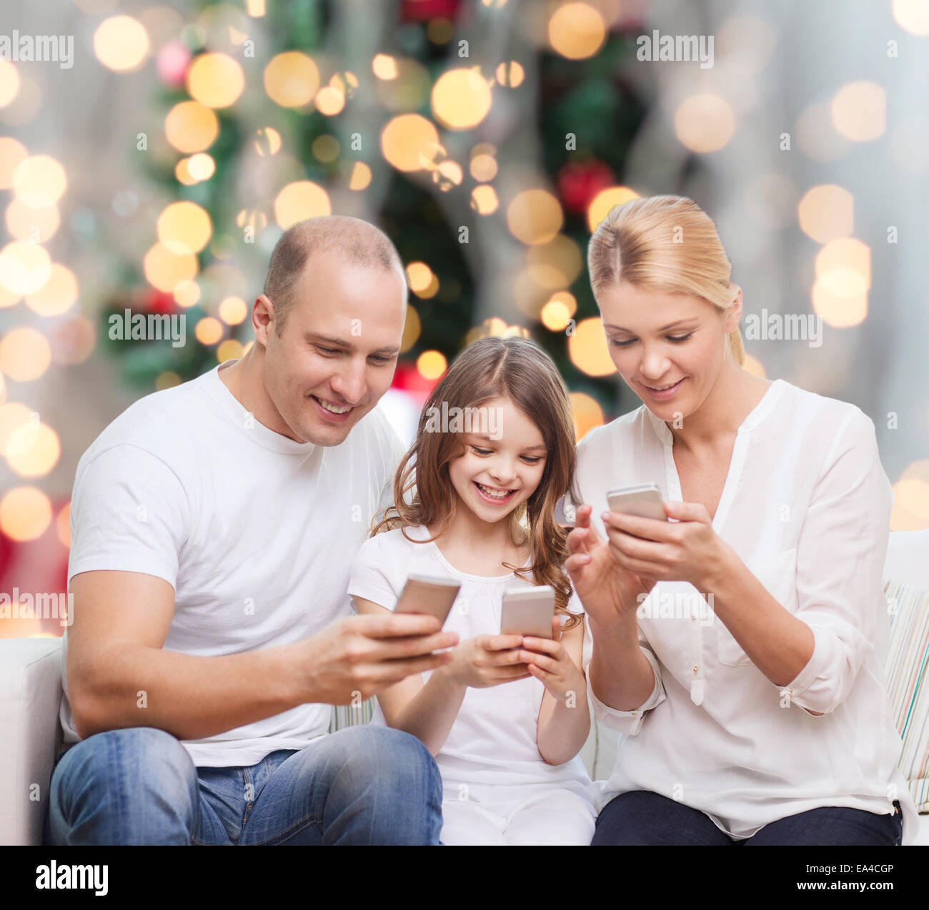 happy family with smartphones Stock Photo - Alamy
