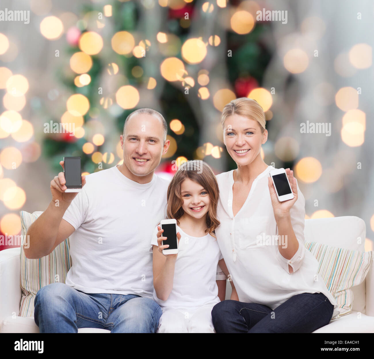 happy family with smartphones Stock Photo - Alamy