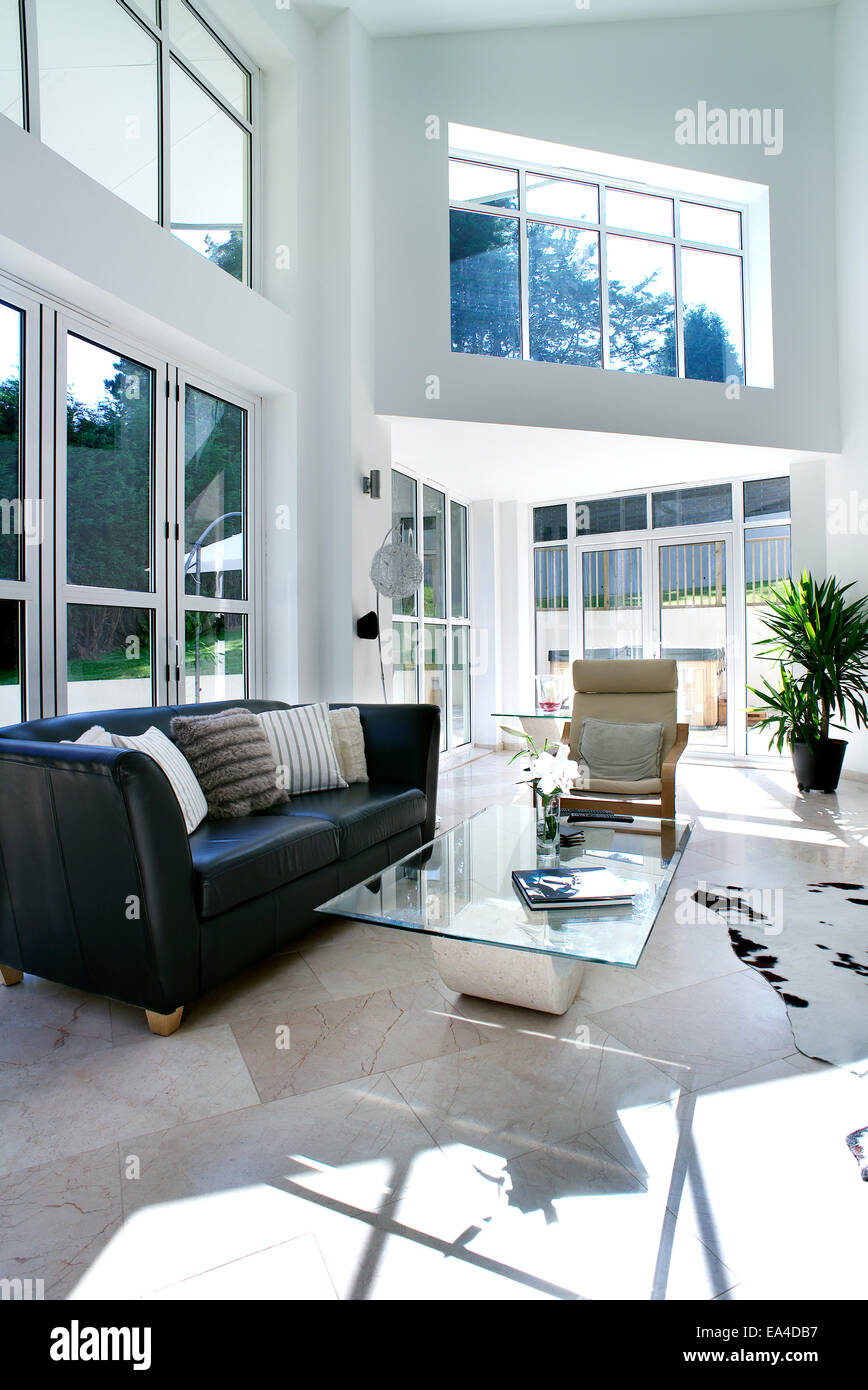 Double height living room in Moonraker house, Exmouth, Devon, UK Stock ...