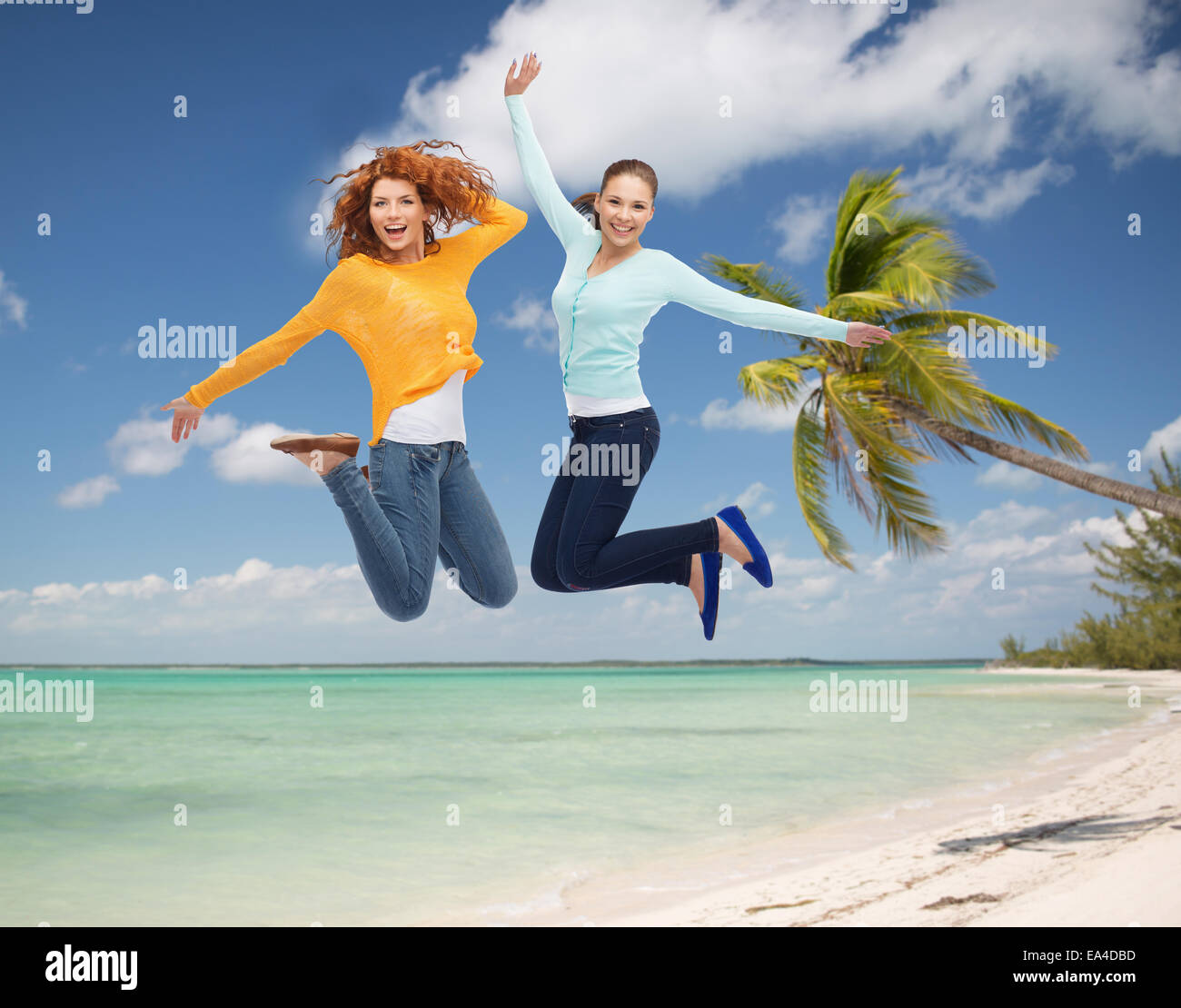 Women jumping hi-res stock photography and images - Alamy