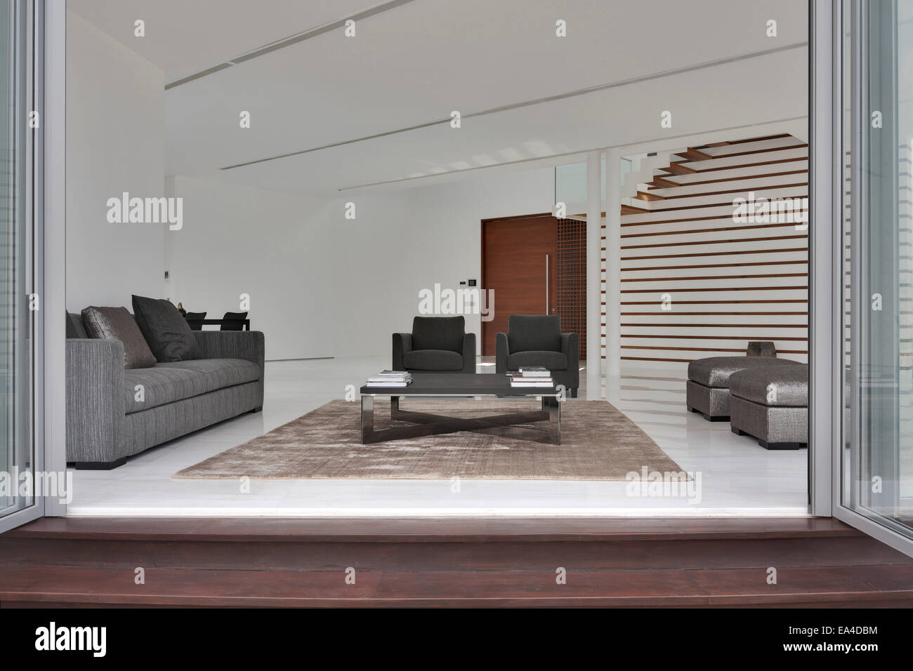 View into luxury living room of modern residential house in Sentosa ...