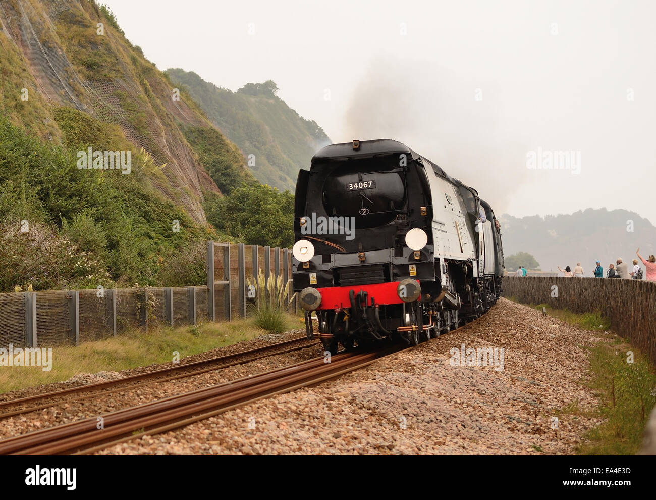 Battle of Britain class pacific No 34067 Tangmere travelling alongside ...