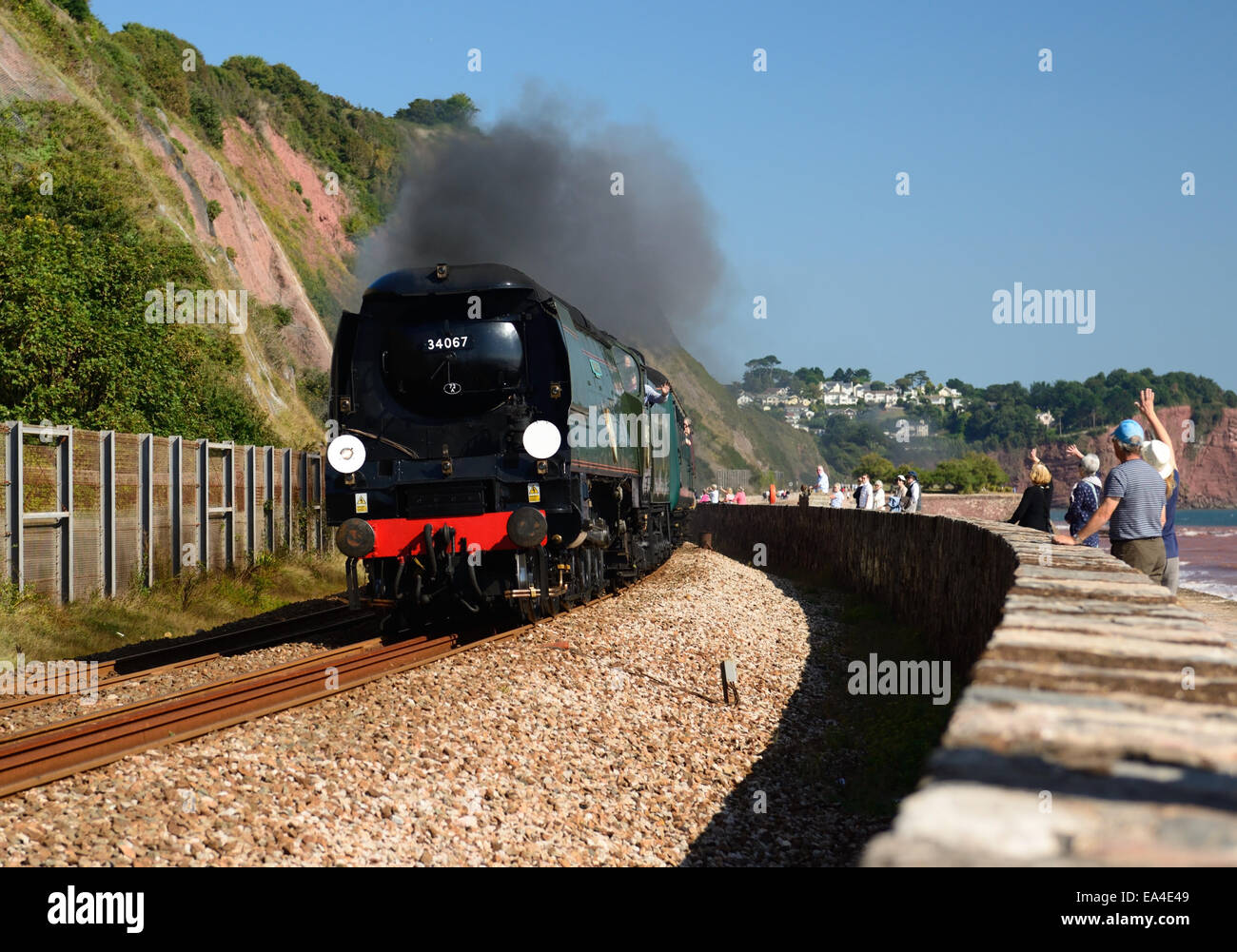 Battle of Britain class pacific No 34067 Tangmere travelling alongside ...
