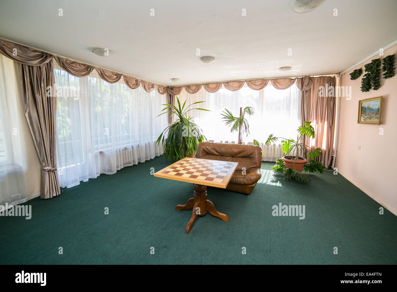Room with chess table Stock Photo - Alamy