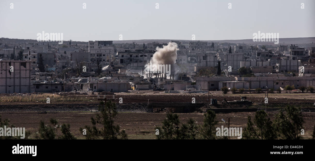 Kobane, Syria. 06th Nov, 2014. Smoke rising during a shelling by ...