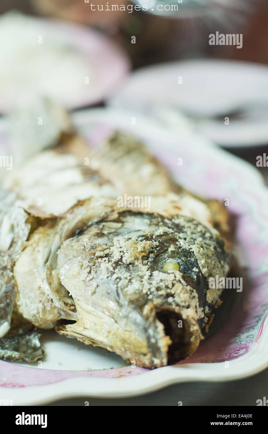 grilled fish in thailand, close up on fish head Stock Photo - Alamy