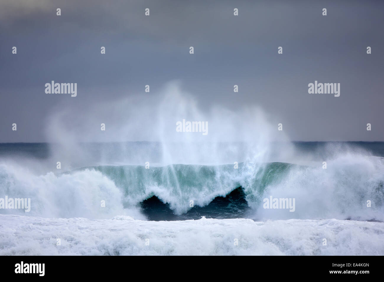 Dramatic ocean wave off the coast of Southern Iceland near the Blue ...