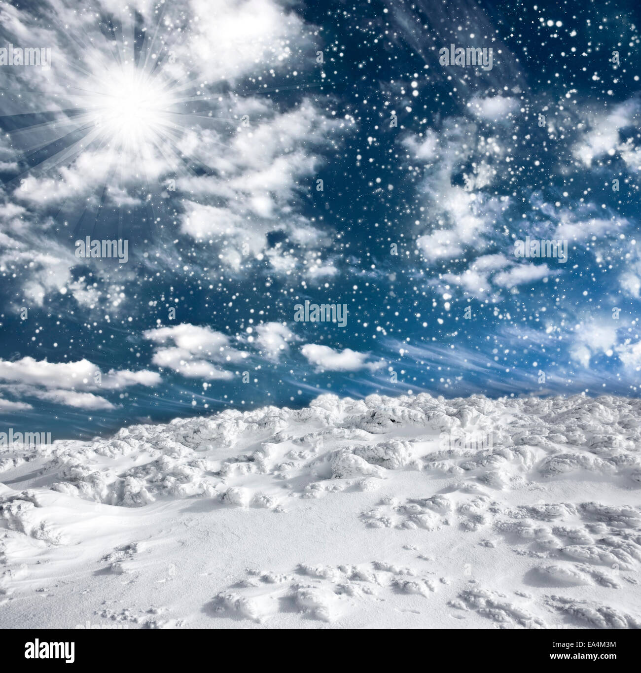 Winter landscape with snow covered hill and cloudy blue sky Stock Photo ...