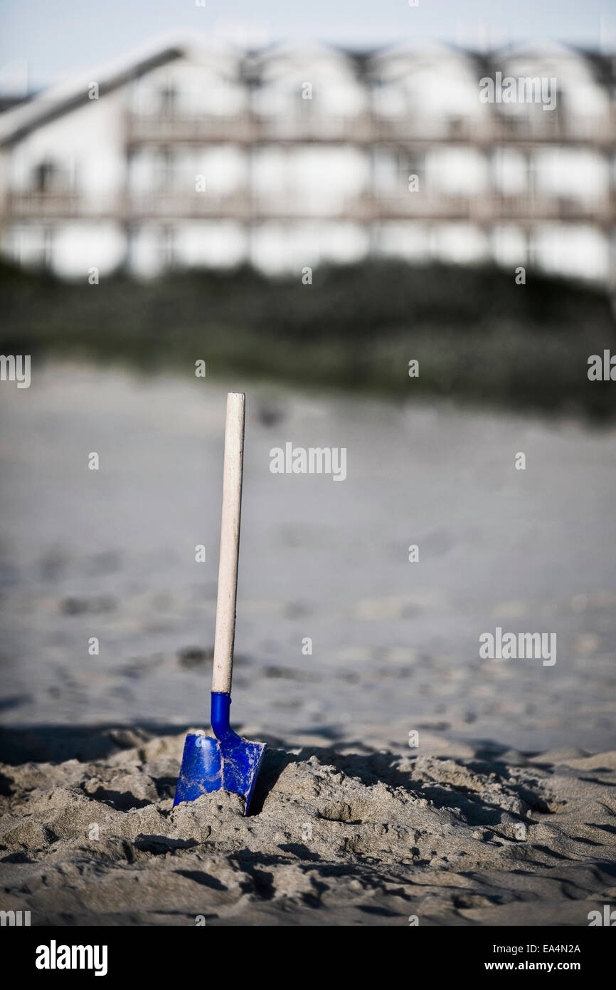 A play shovel in the sand; Cannon Beach, Oregon, United States of ...