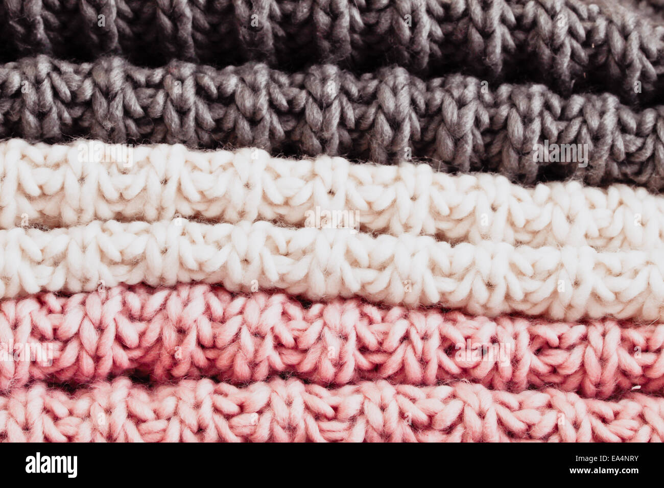 Folded wool in three colours Stock Photo - Alamy