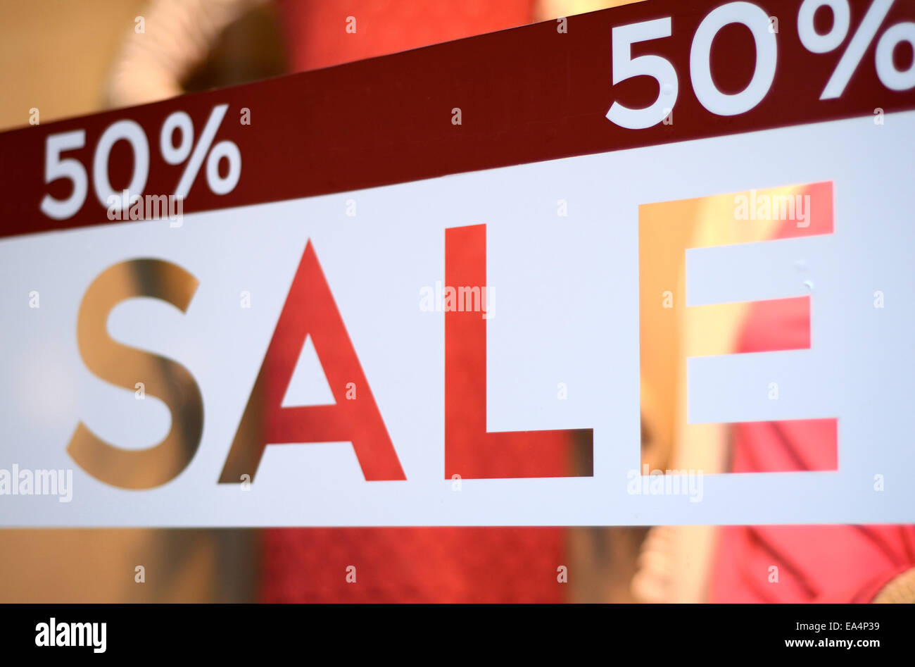 Sale Sign In A Clothing Store Window Stock Photo - Alamy