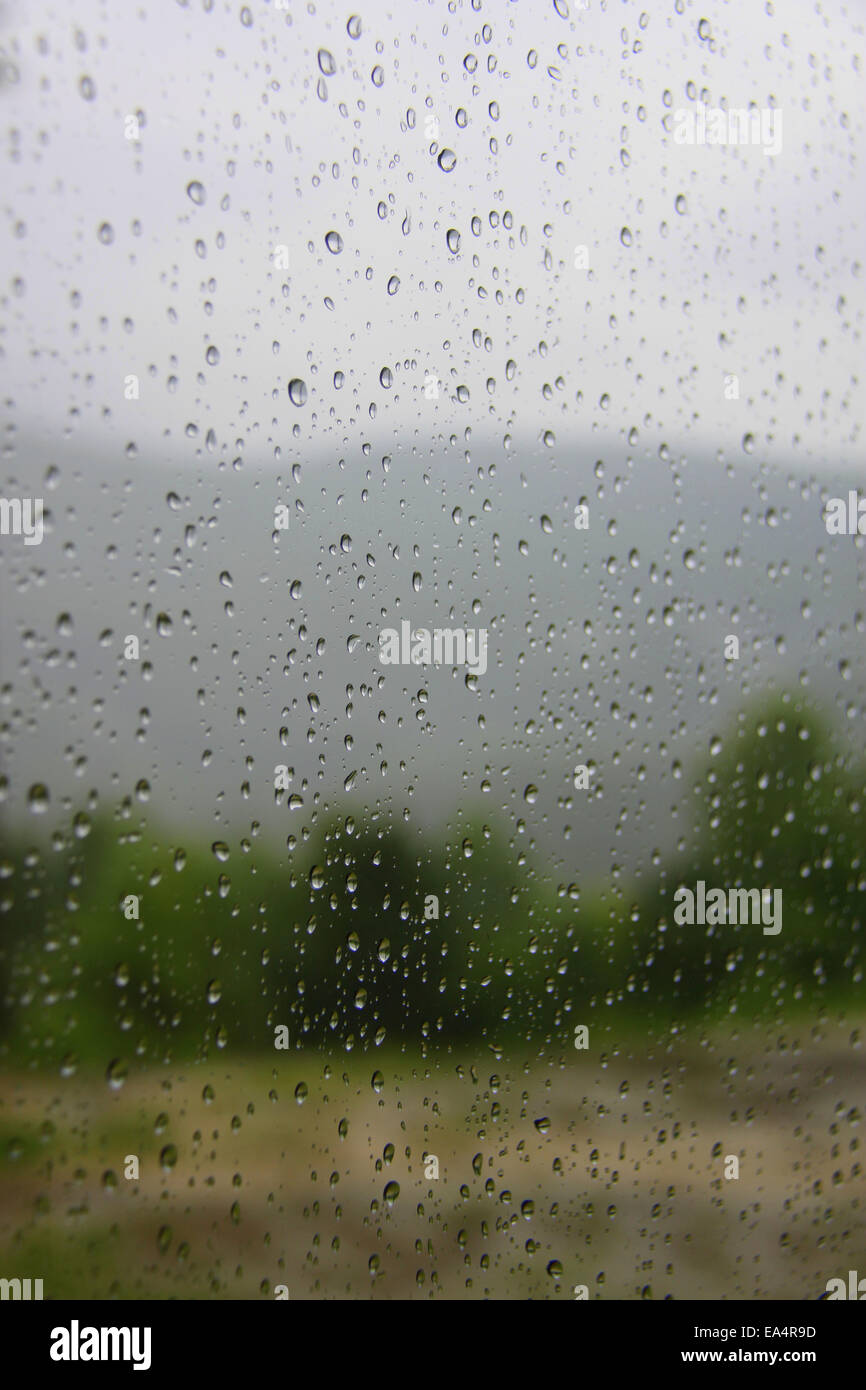 Rainy weather landscape through window hi-res stock photography and ...