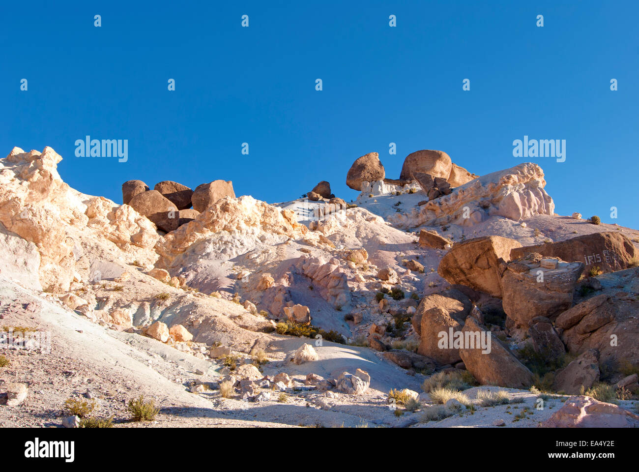 Colourful desert rock formation in late afternoon light; Mendoza ...