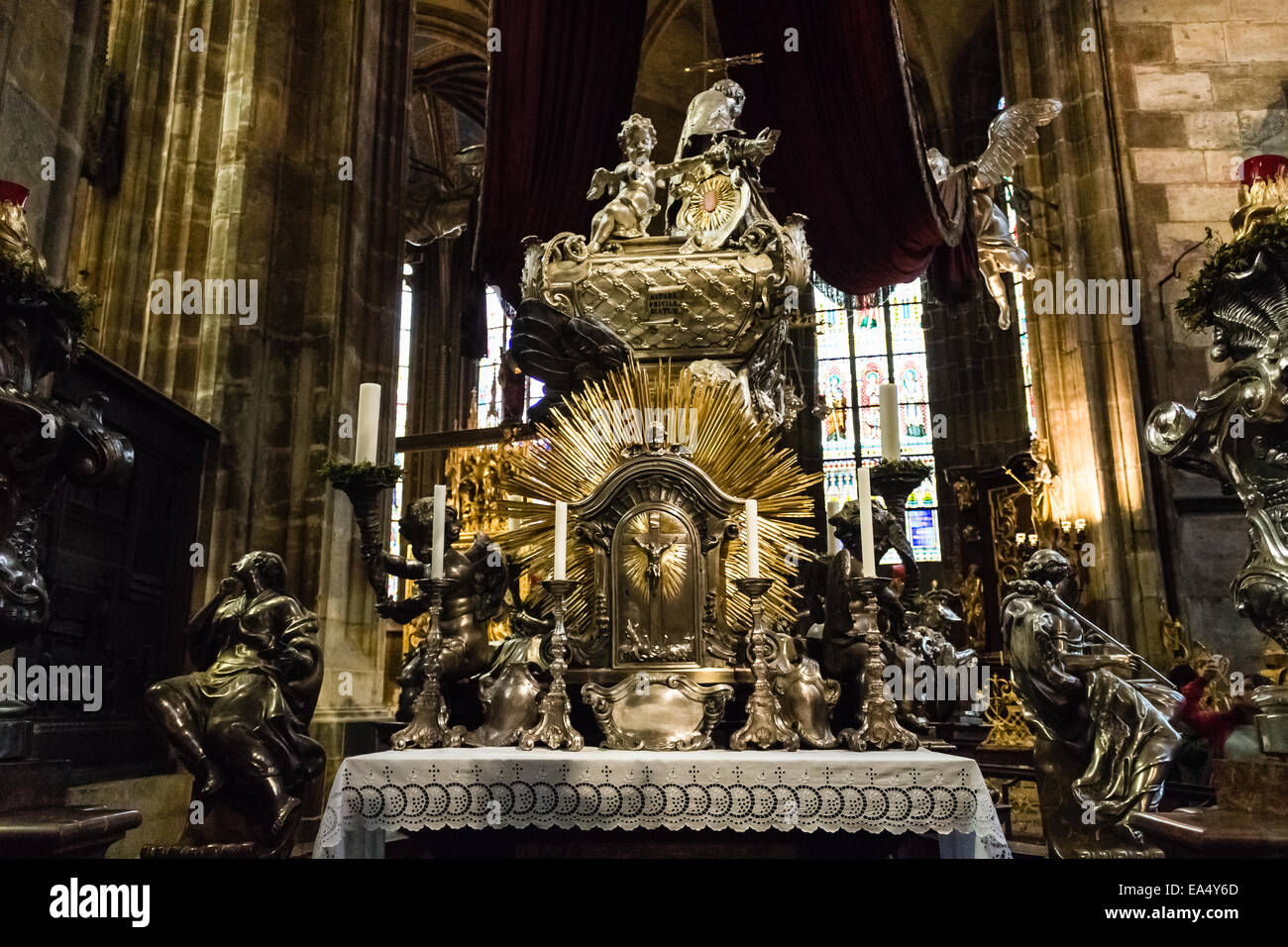 Golden altar with statues and catholic objects and symbols inside Saint ...