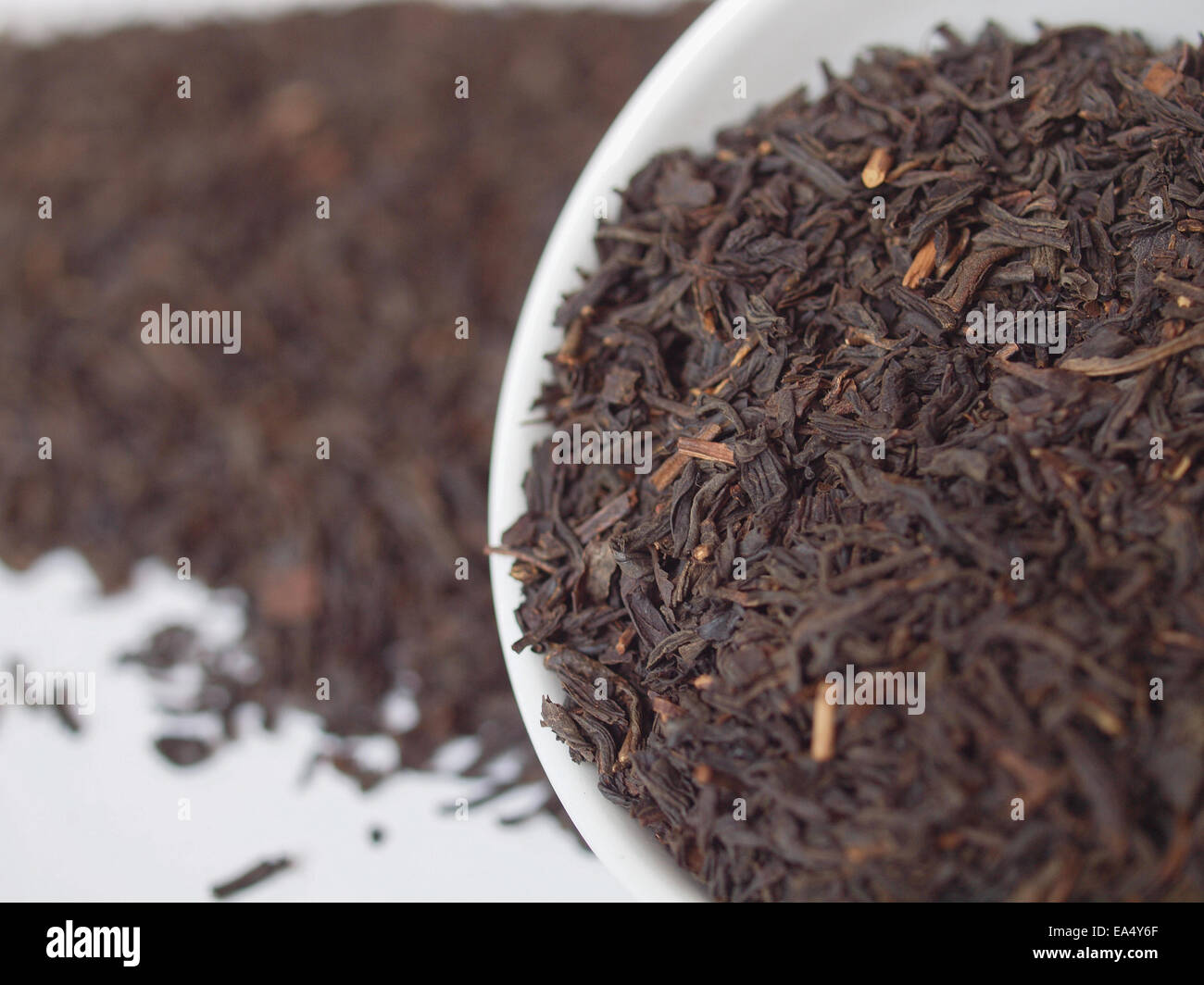 Loose tea leaves in a small bowl Stock Photo - Alamy