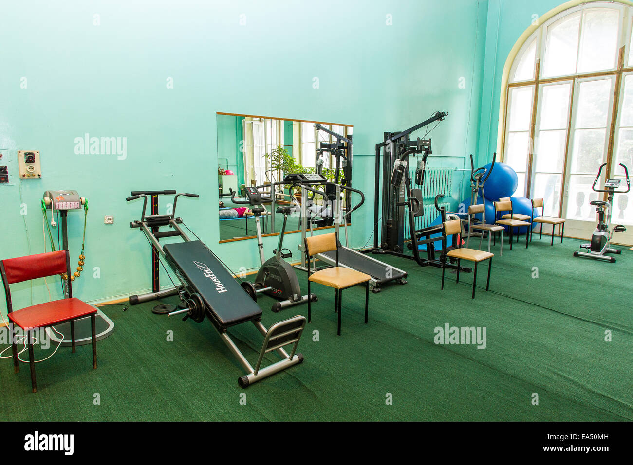Traineger equipments in fitness center, gym Stock Photo - Alamy