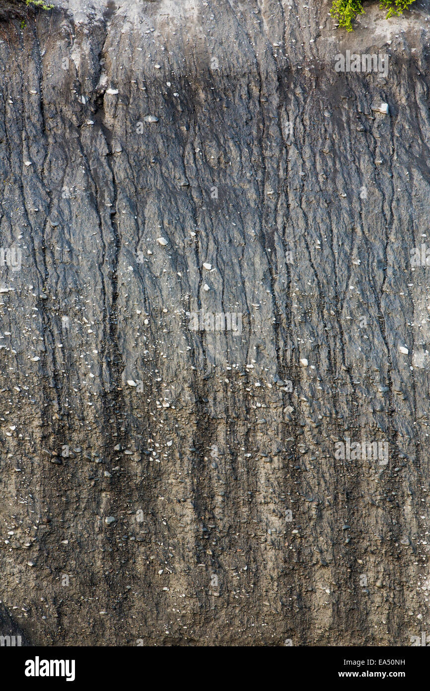 Close up of a rock surface showing layers of sediment; Valdez, Alaska ...
