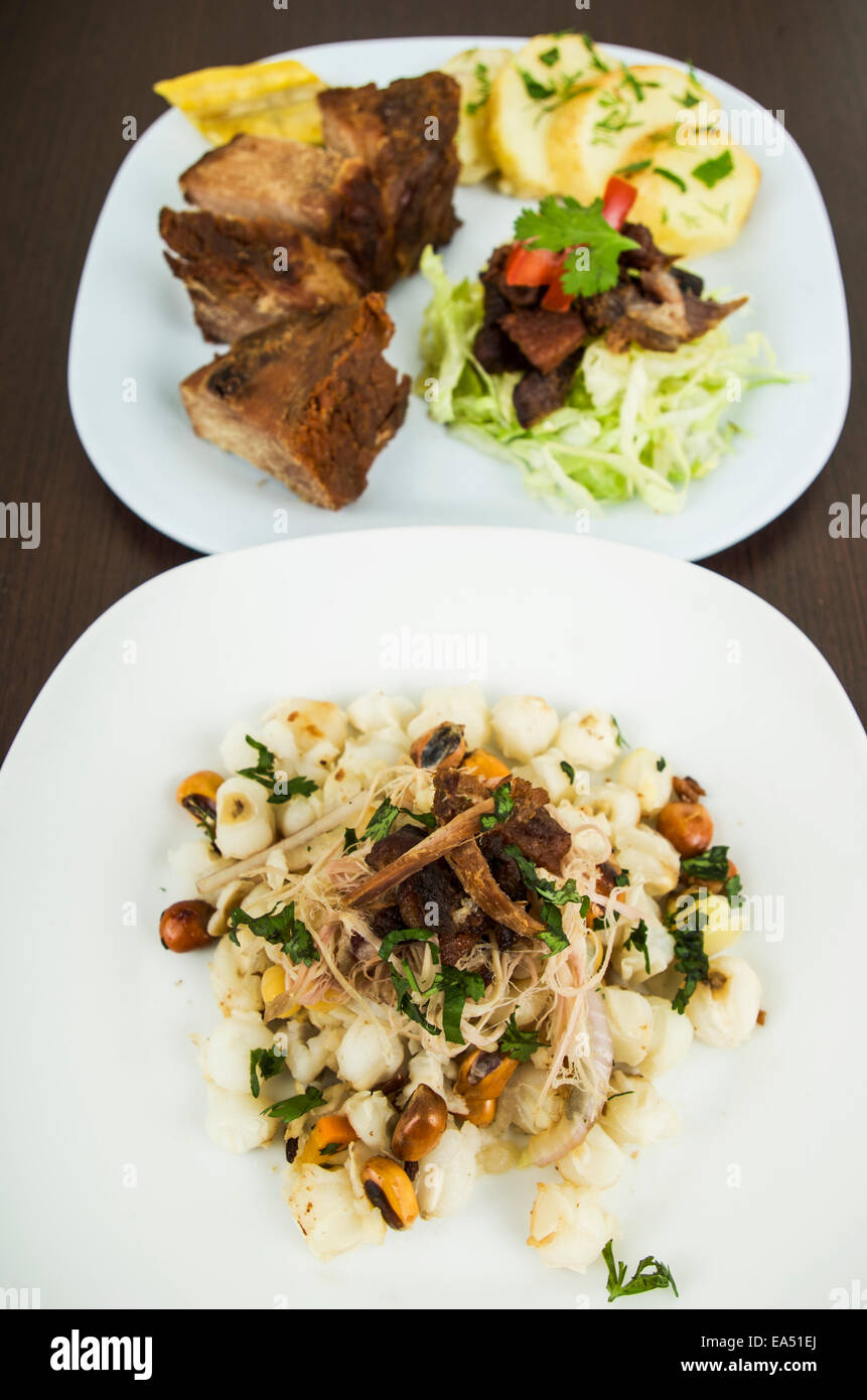 mote tostado con chicharron and fritada Ecuadorian food Stock Photo - Alamy