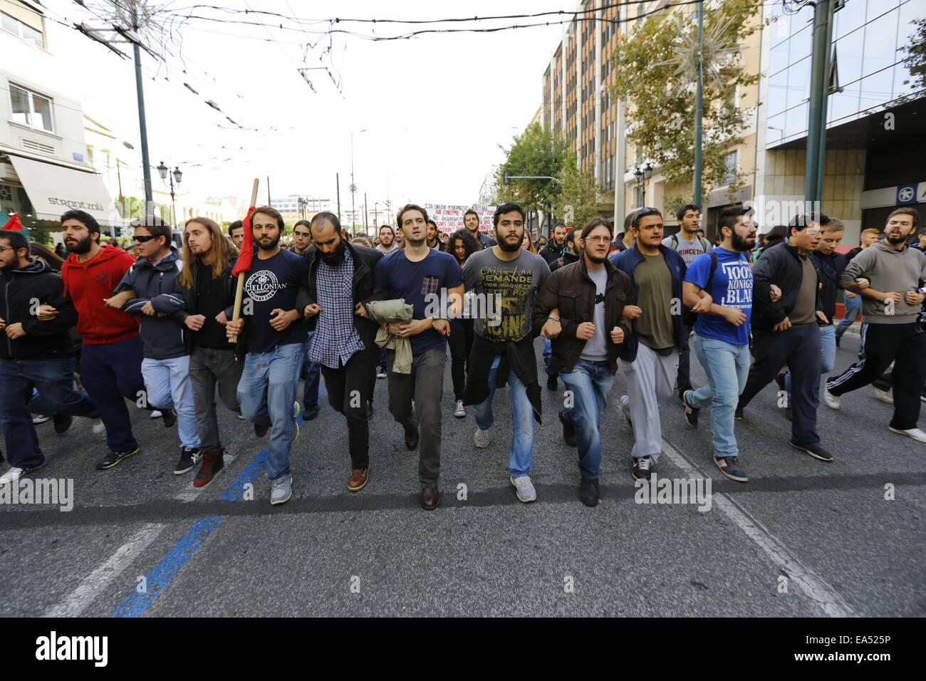 Greek University students protest by forming a human chain and march ...