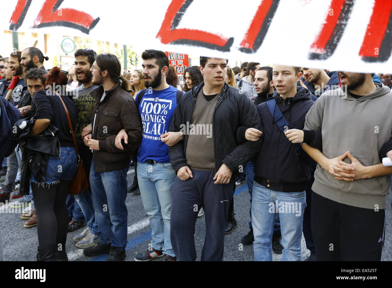 Greek University students protest by forming a human chain and march ...