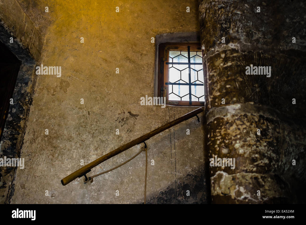 Medieval window with wooden frame and iron grating in Prague. Ancient ...