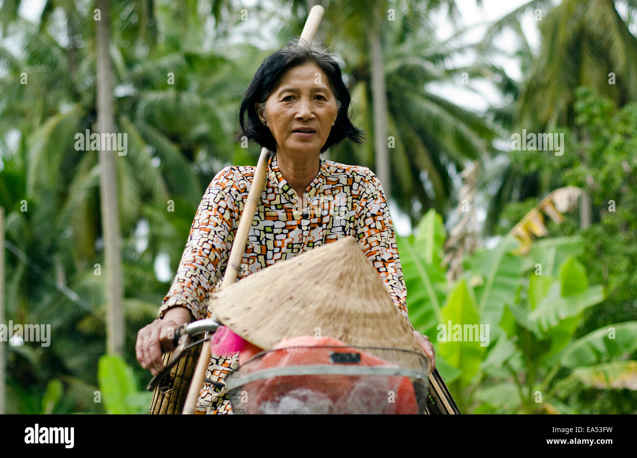Cycling in traditional village hi-res stock photography and images - Alamy