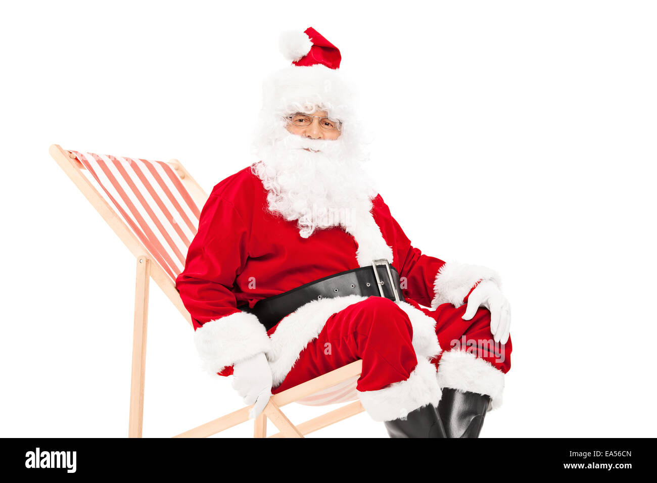 Santa Claus seated in a sun lounger isolated on white background Stock ...