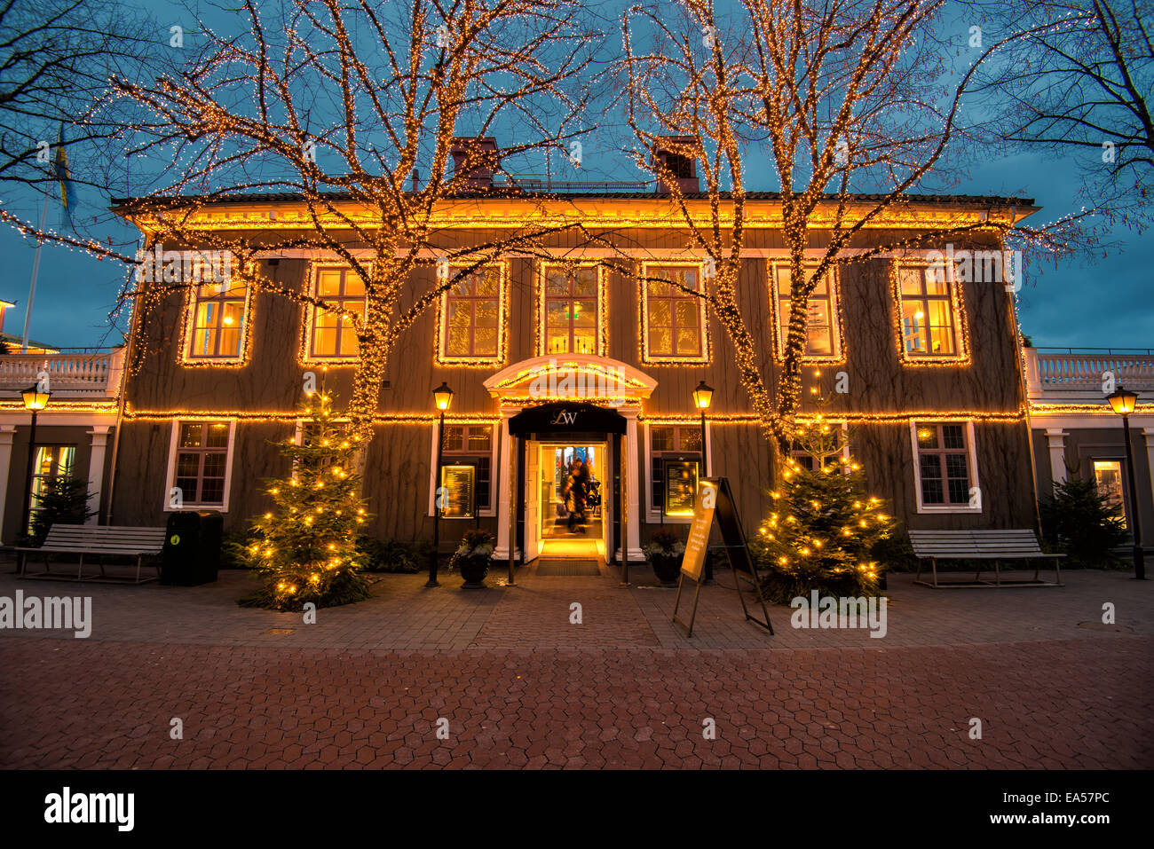 Illuminated building and trees during the Christmas market at Liseberg ...