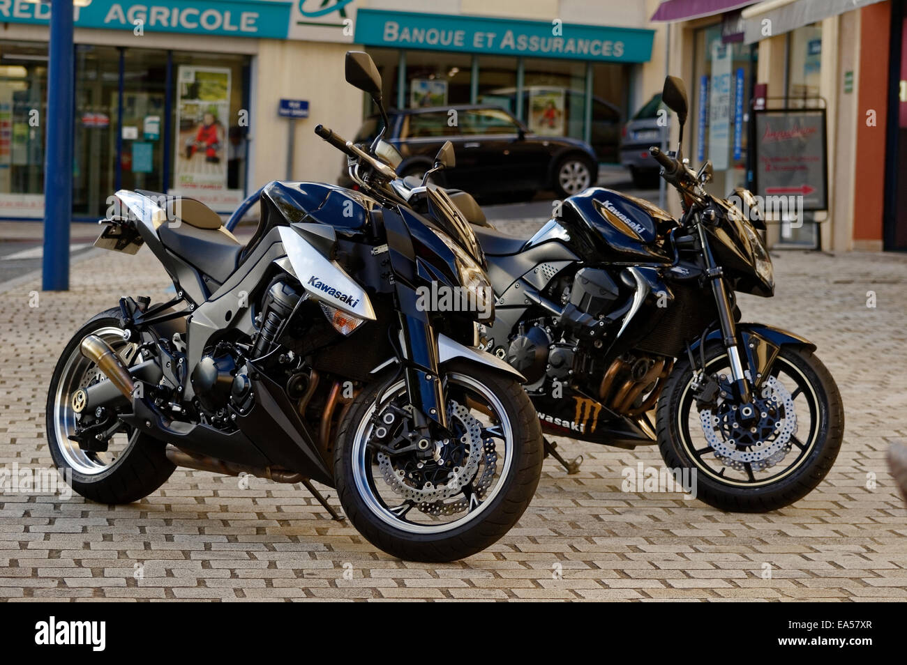 Motorcycles parked in a square Stock Photo - Alamy
