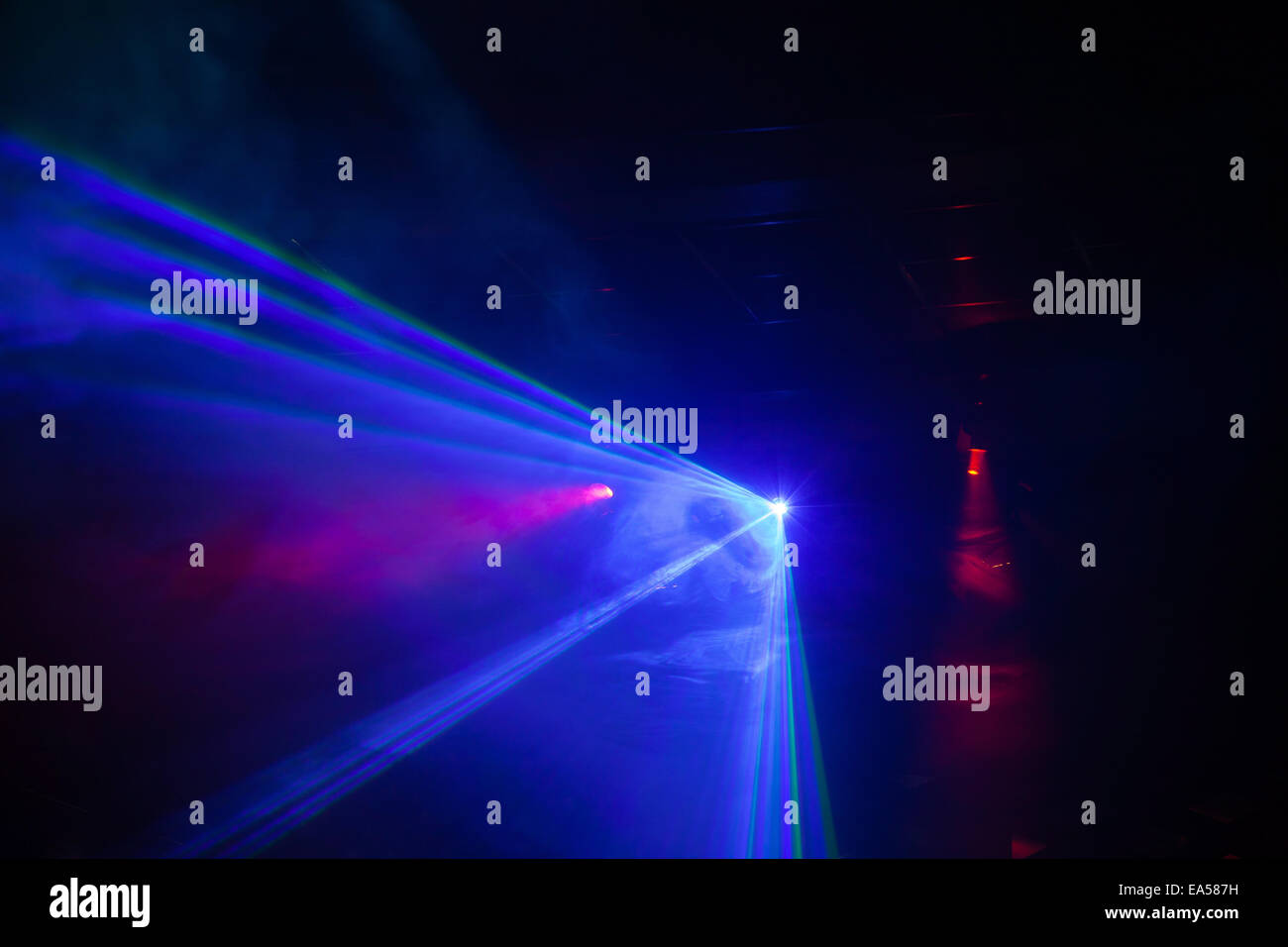 Disco light show, Stage lights with laser Stock Photo - Alamy