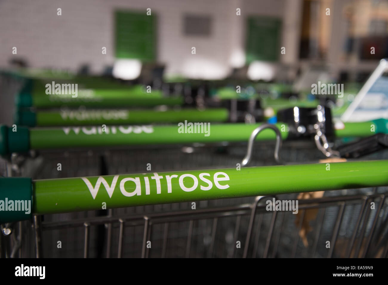 Waitrose supermarket trolleys Stock Photo - Alamy