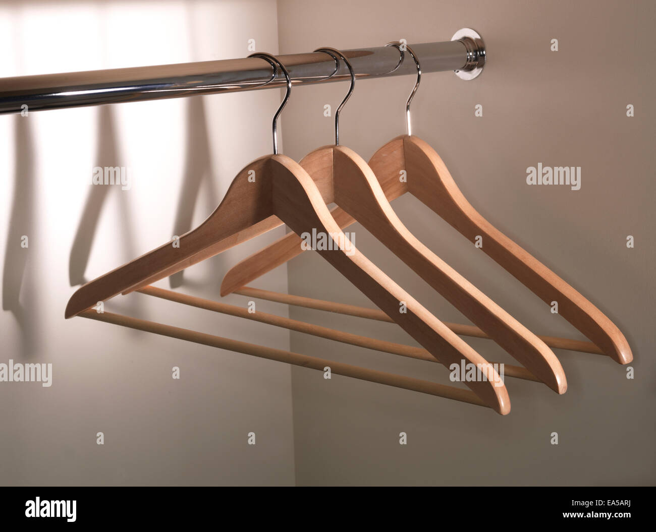 Empty wardrobe with hangers Stock Photo - Alamy