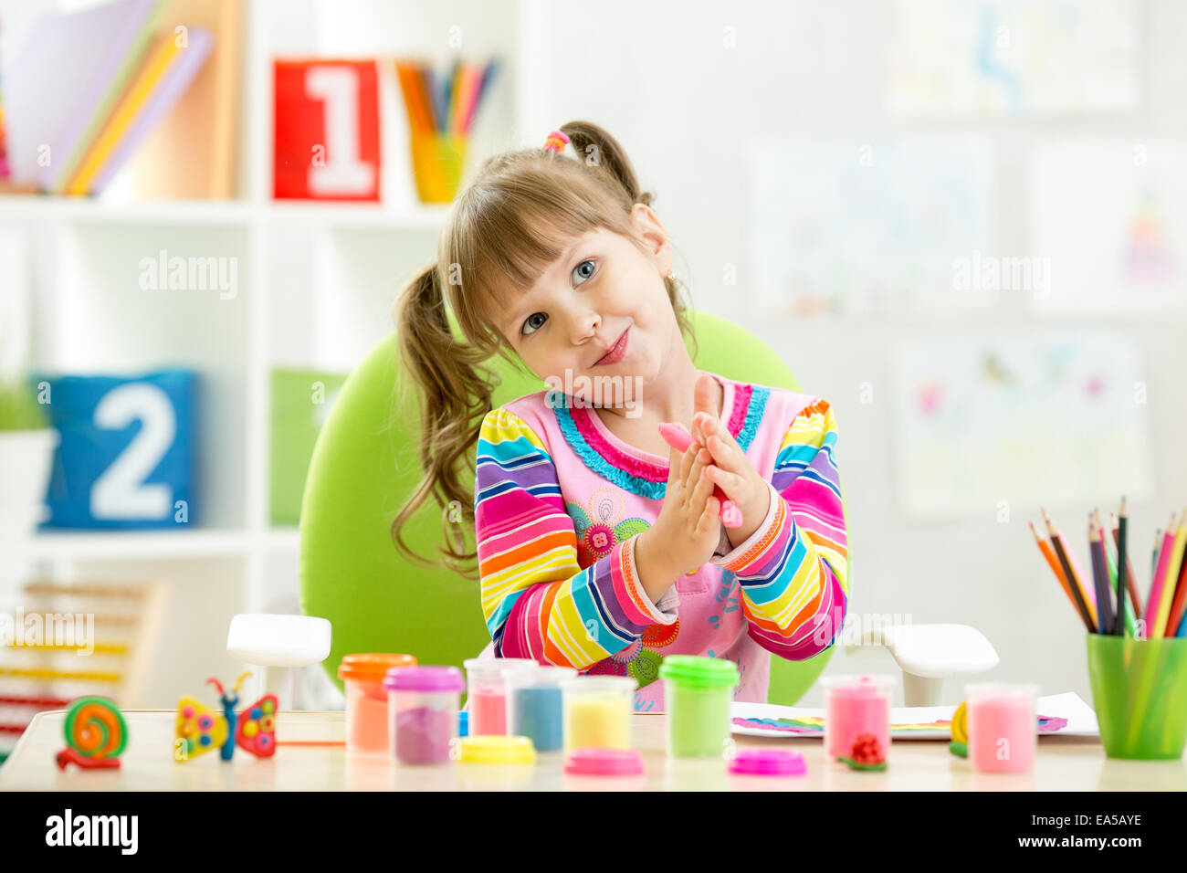 child girl drawing and making by hands Stock Photo - Alamy