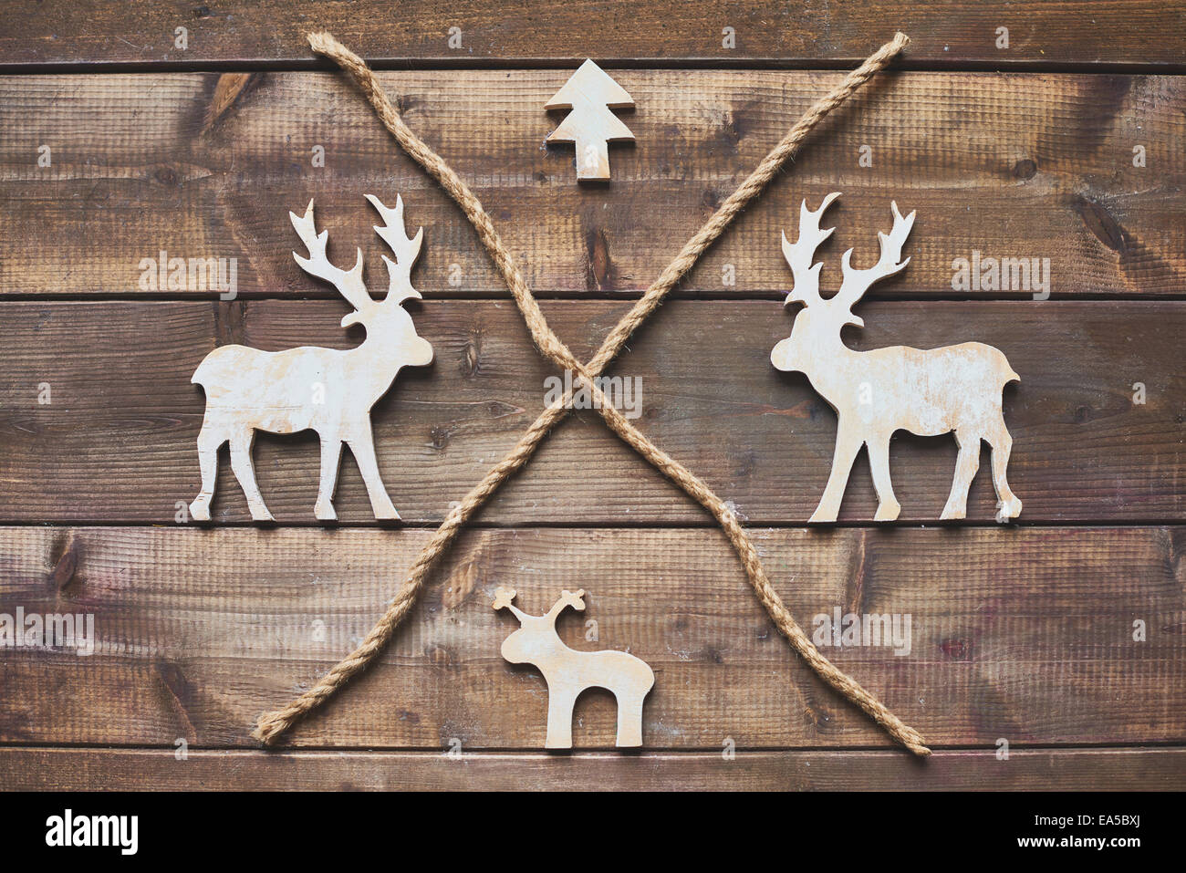 Wooden Christmas symbols and two ropes Stock Photo - Alamy
