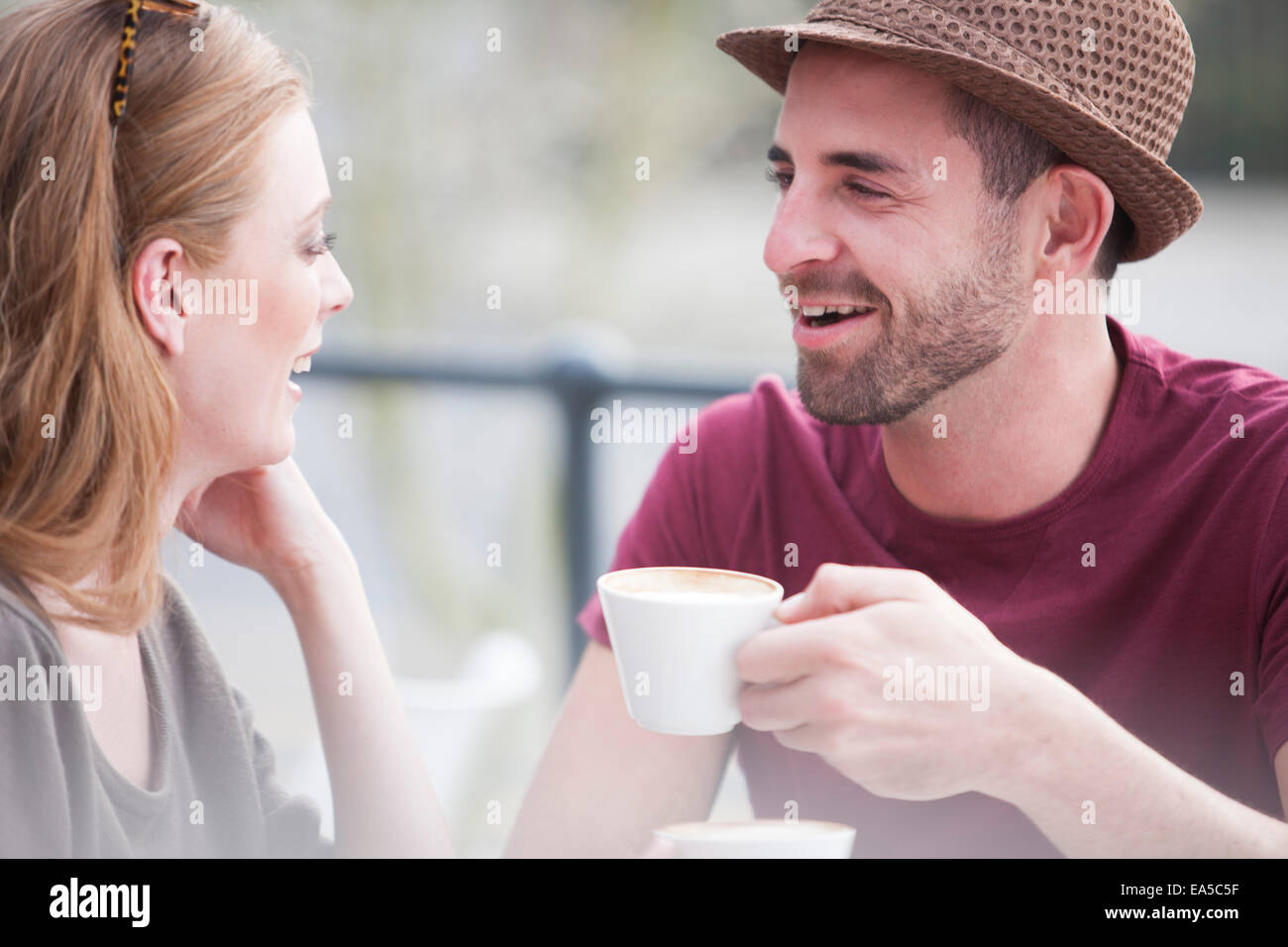 Couple having a coffee break Stock Photo - Alamy