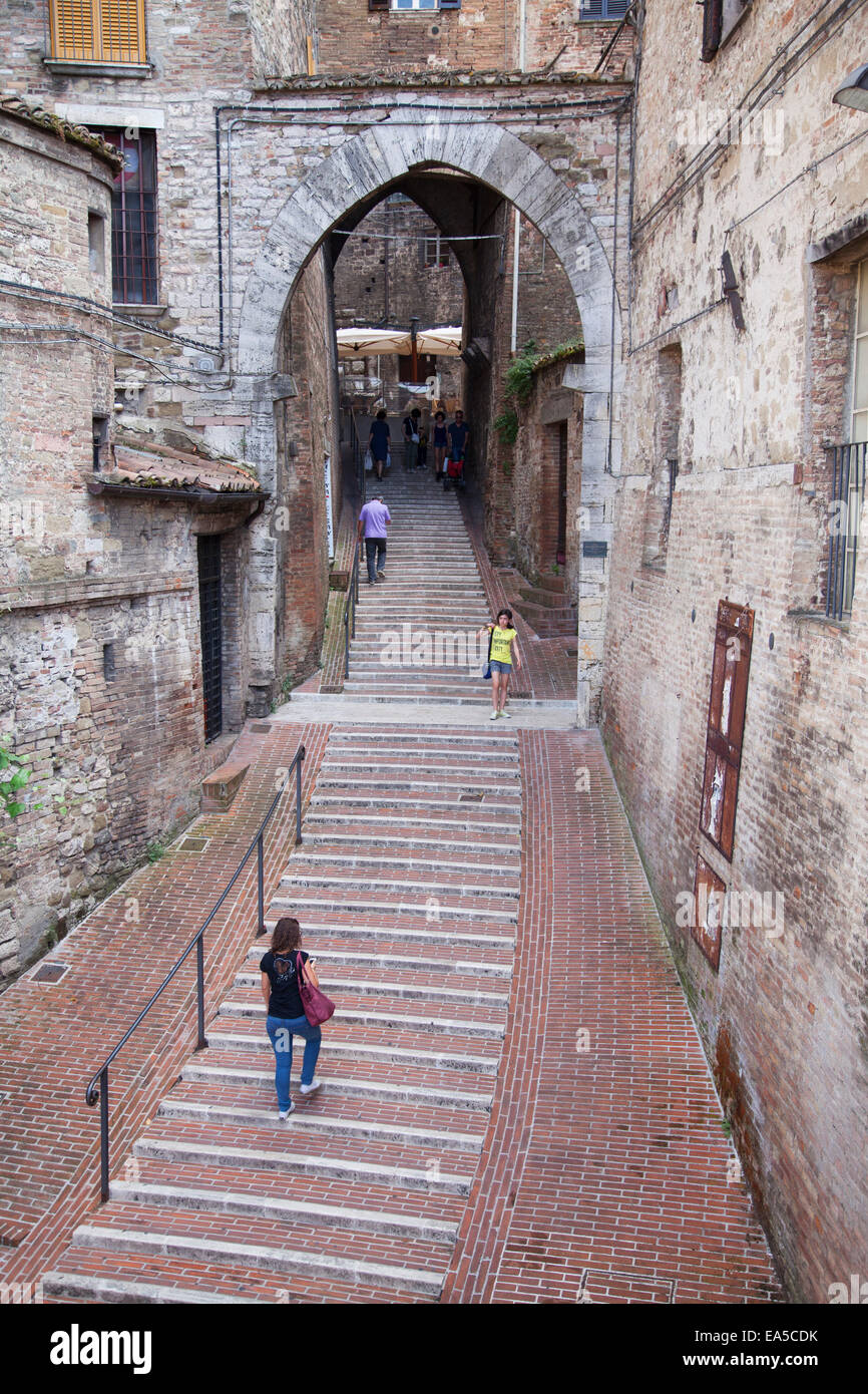 People walking along Via dei Priori, Perugia, Umbria, Italy Stock Photo ...