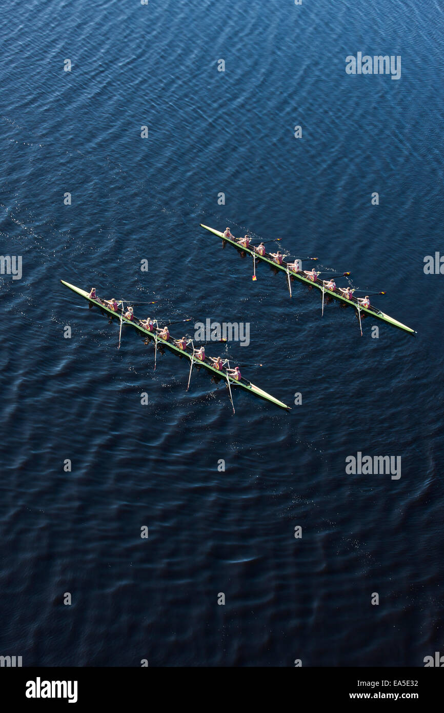 Elevated view of two rowing eights in water Stock Photo - Alamy