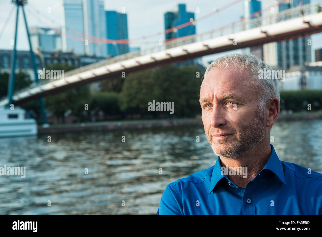 Germany, Frankfurt, businessman at river Main Stock Photo - Alamy