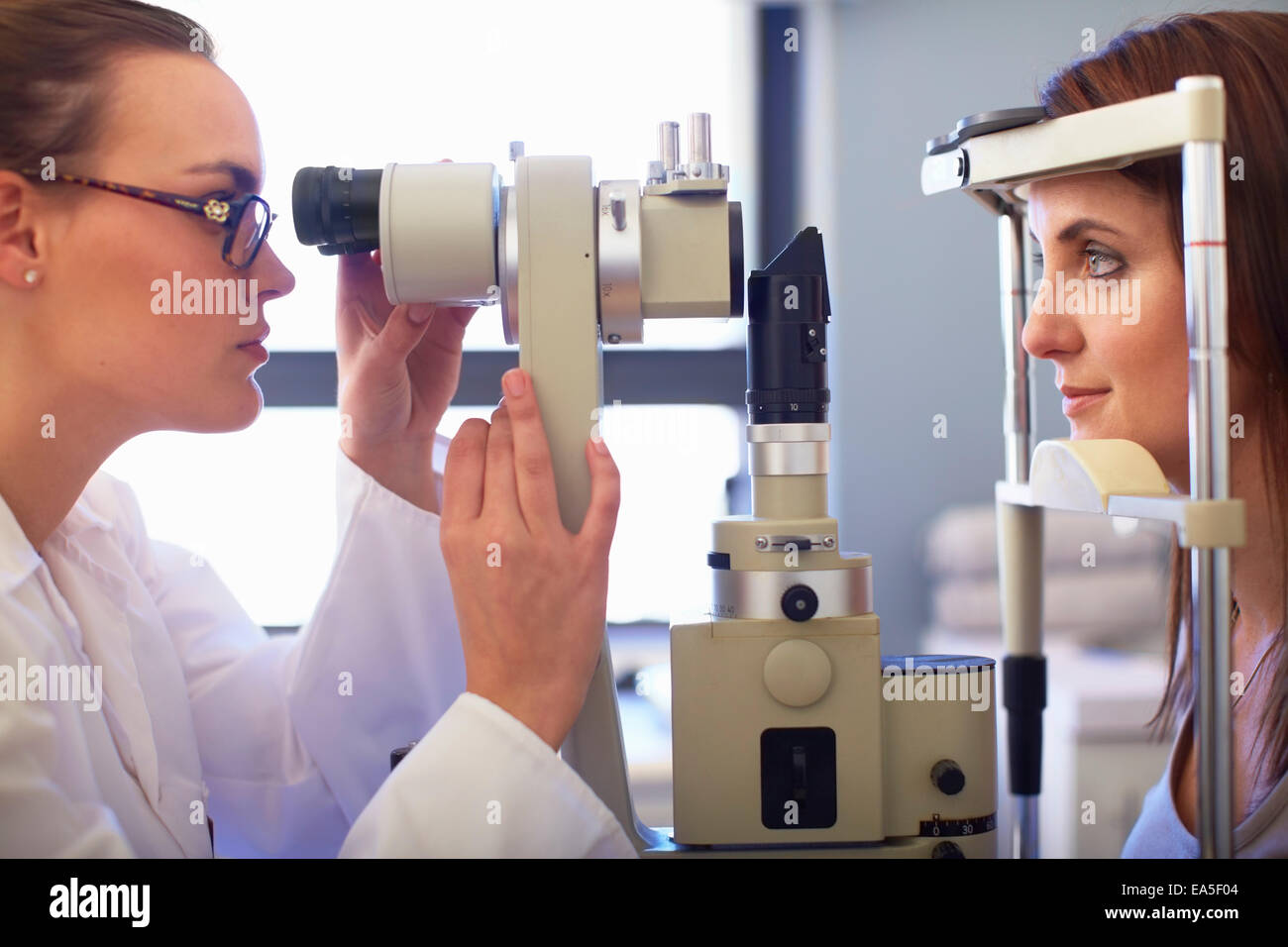 Doctor adjusting vision patient hi-res stock photography and images - Alamy