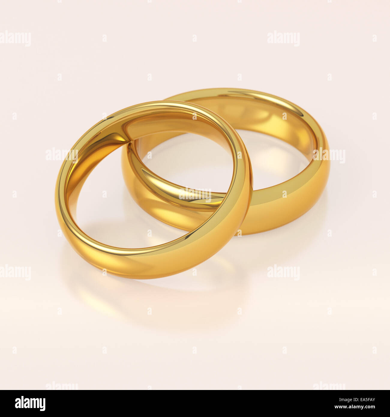 Two golden wedding rings Stock Photo - Alamy