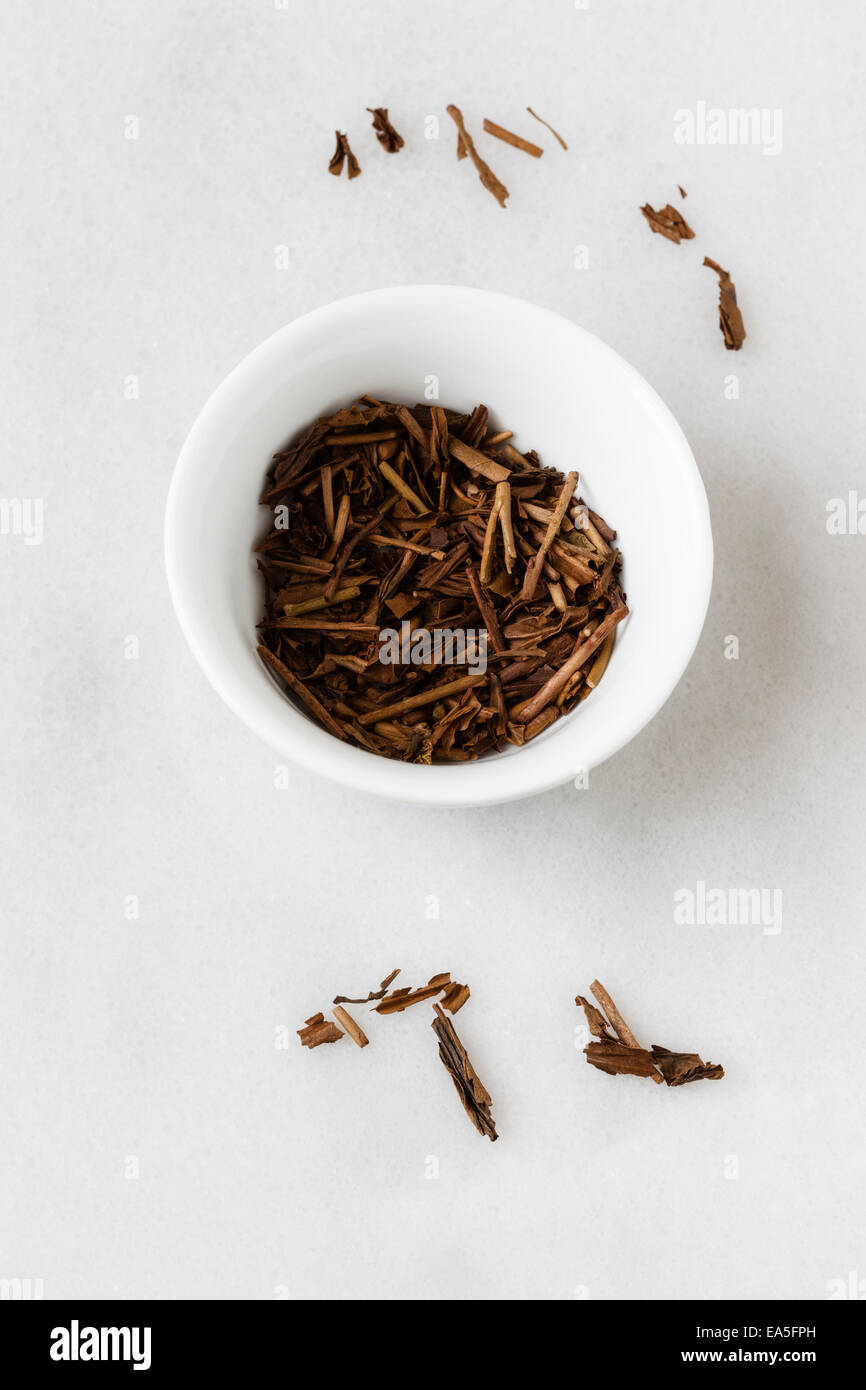 Bowl of Hojicha on white background Stock Photo - Alamy