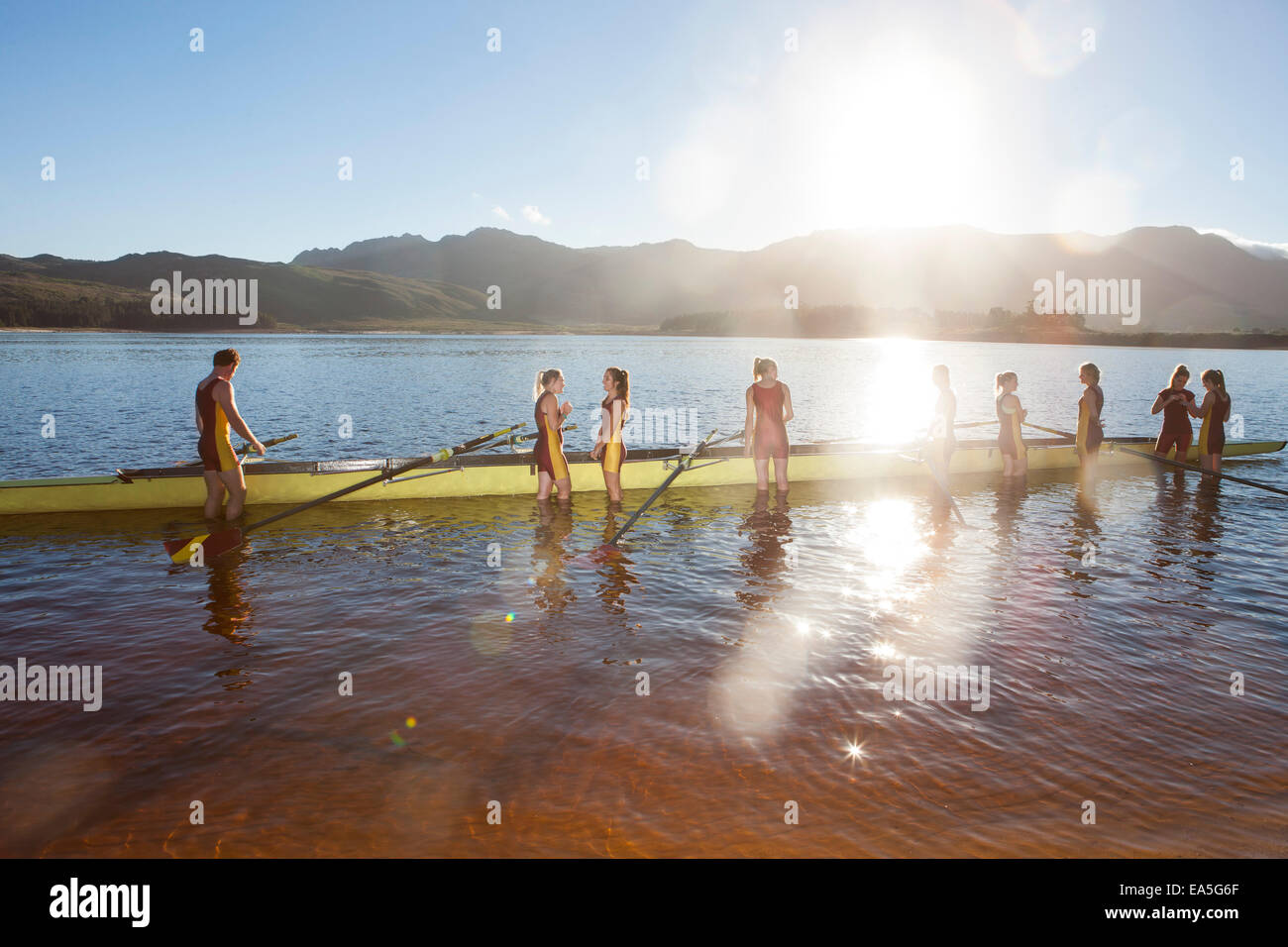 Female's rowing eight in water Stock Photo - Alamy