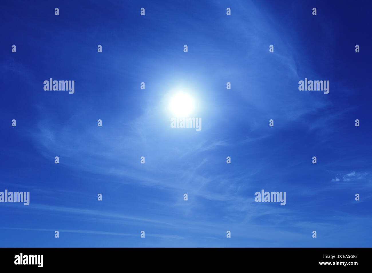 Beautiful bright white sun and blue sky Stock Photo - Alamy