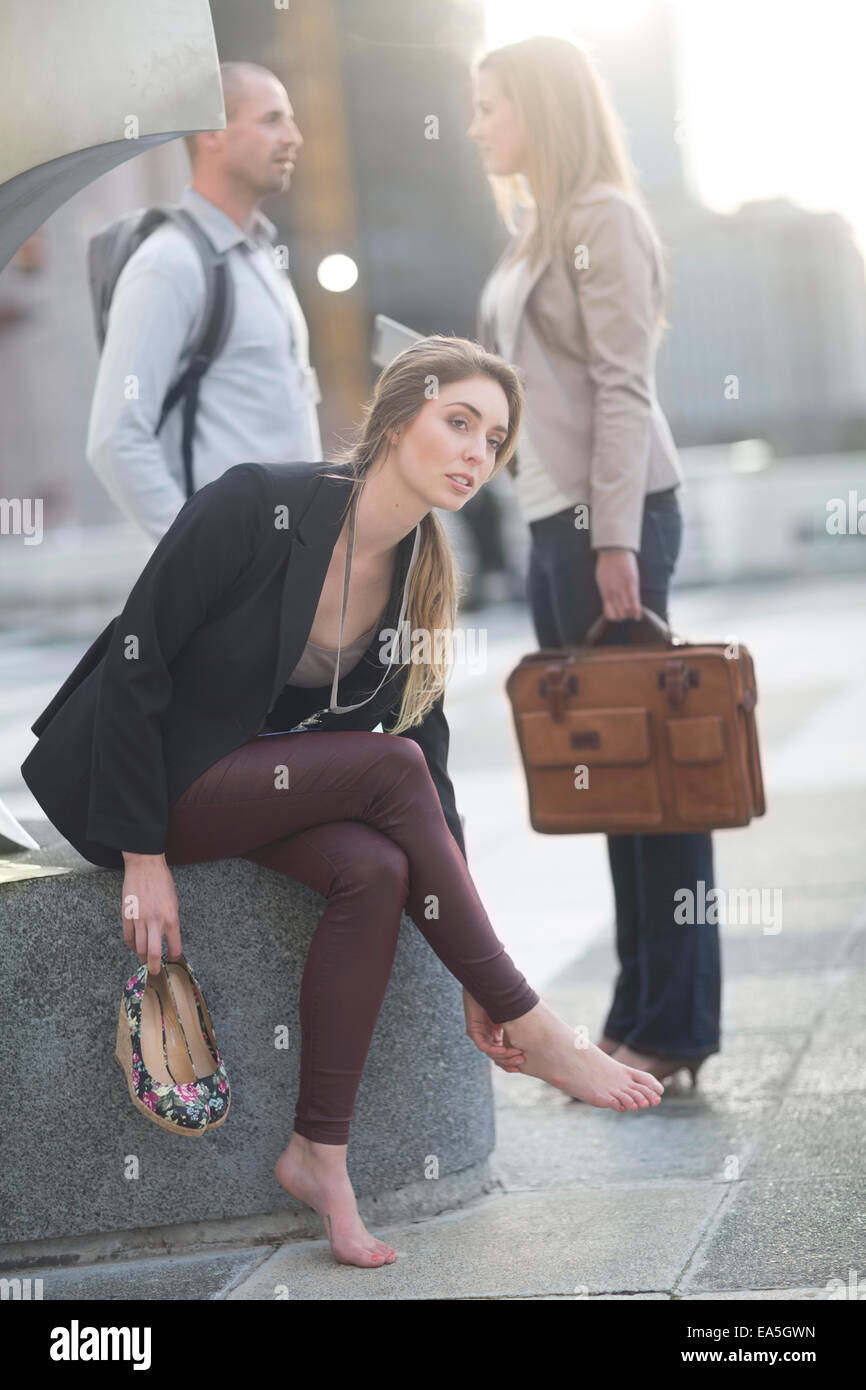 Businesswomen relaxing without shoes hi-res stock photography and ...